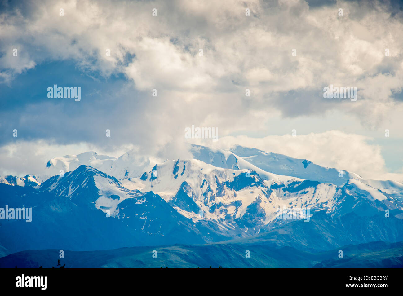 Alaska mountain range being eclipse with heavy cloud cover Stock Photo ...