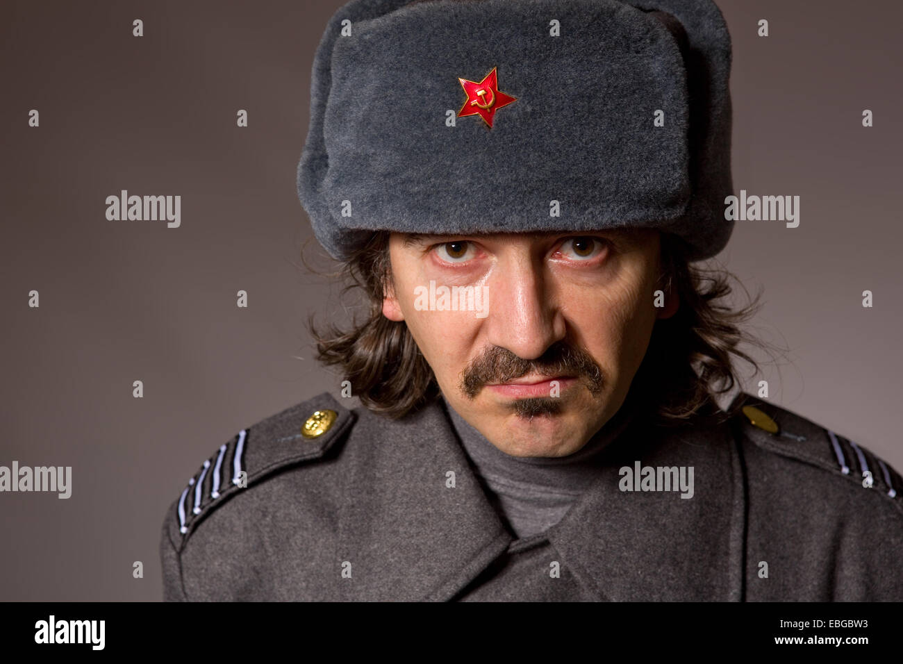 young man dressed as russian military, studio picture Stock Photo - Alamy