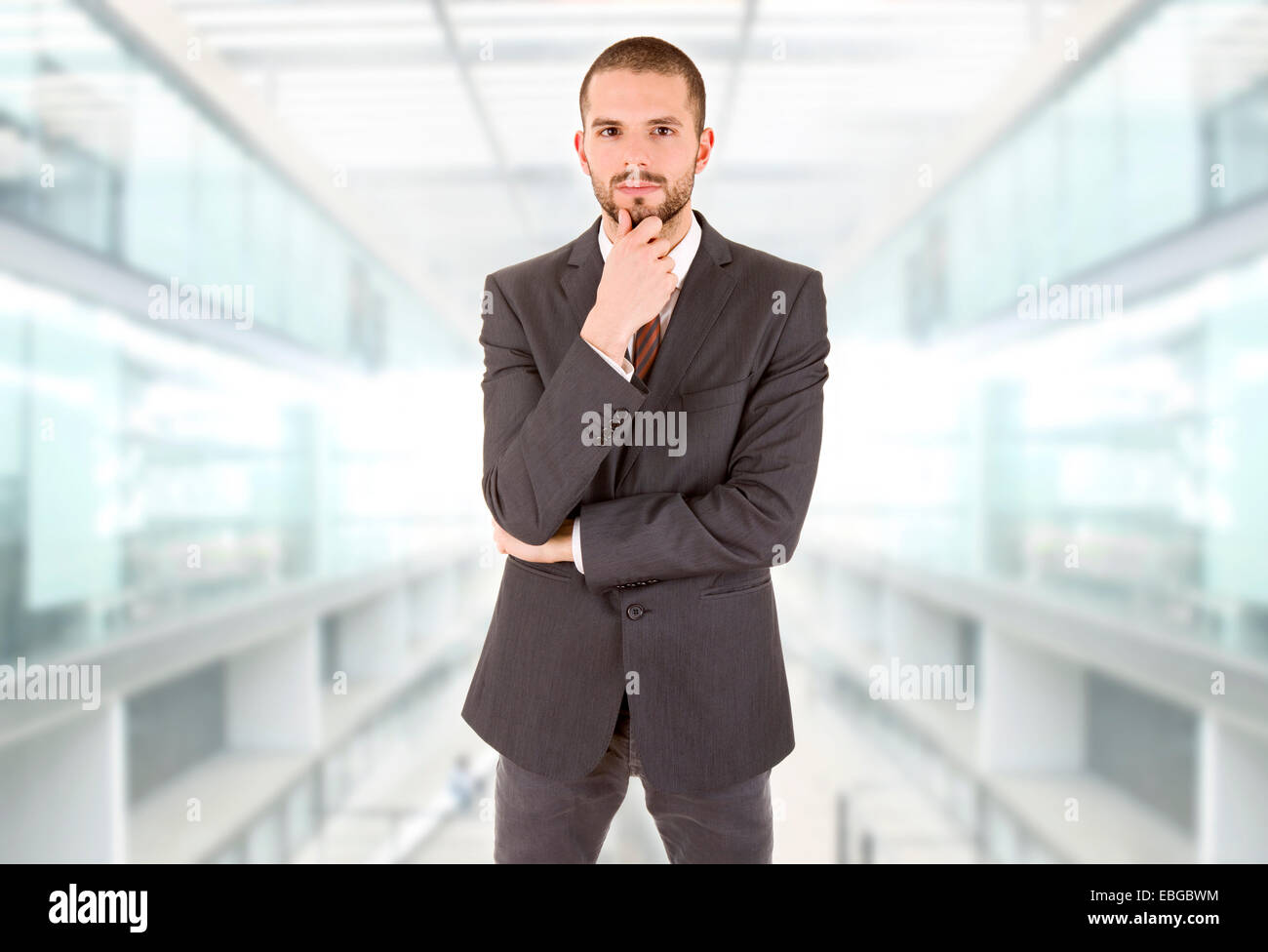 young business man thinking at the office Stock Photo - Alamy