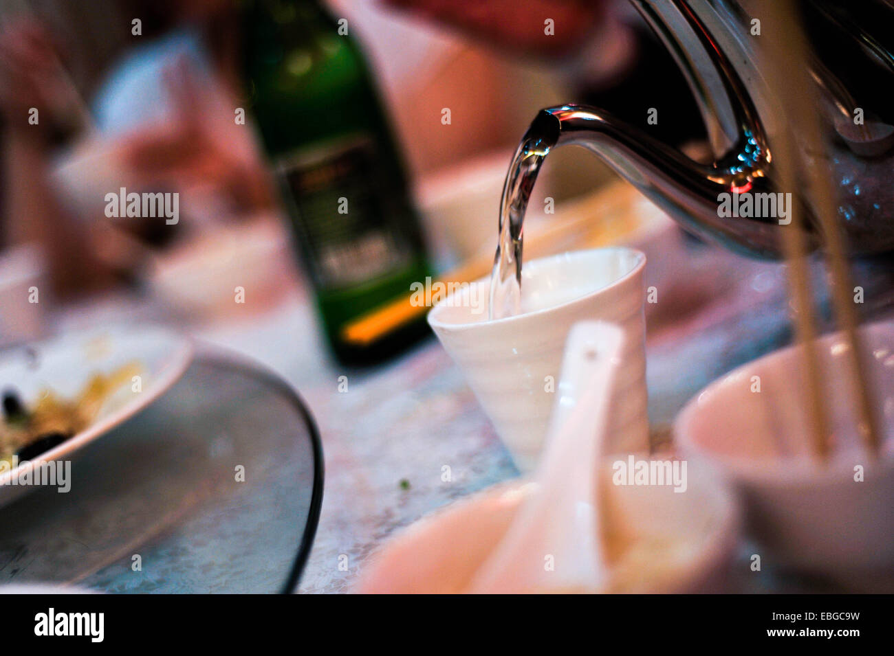 Water being poured in a glass Stock Photo - Alamy