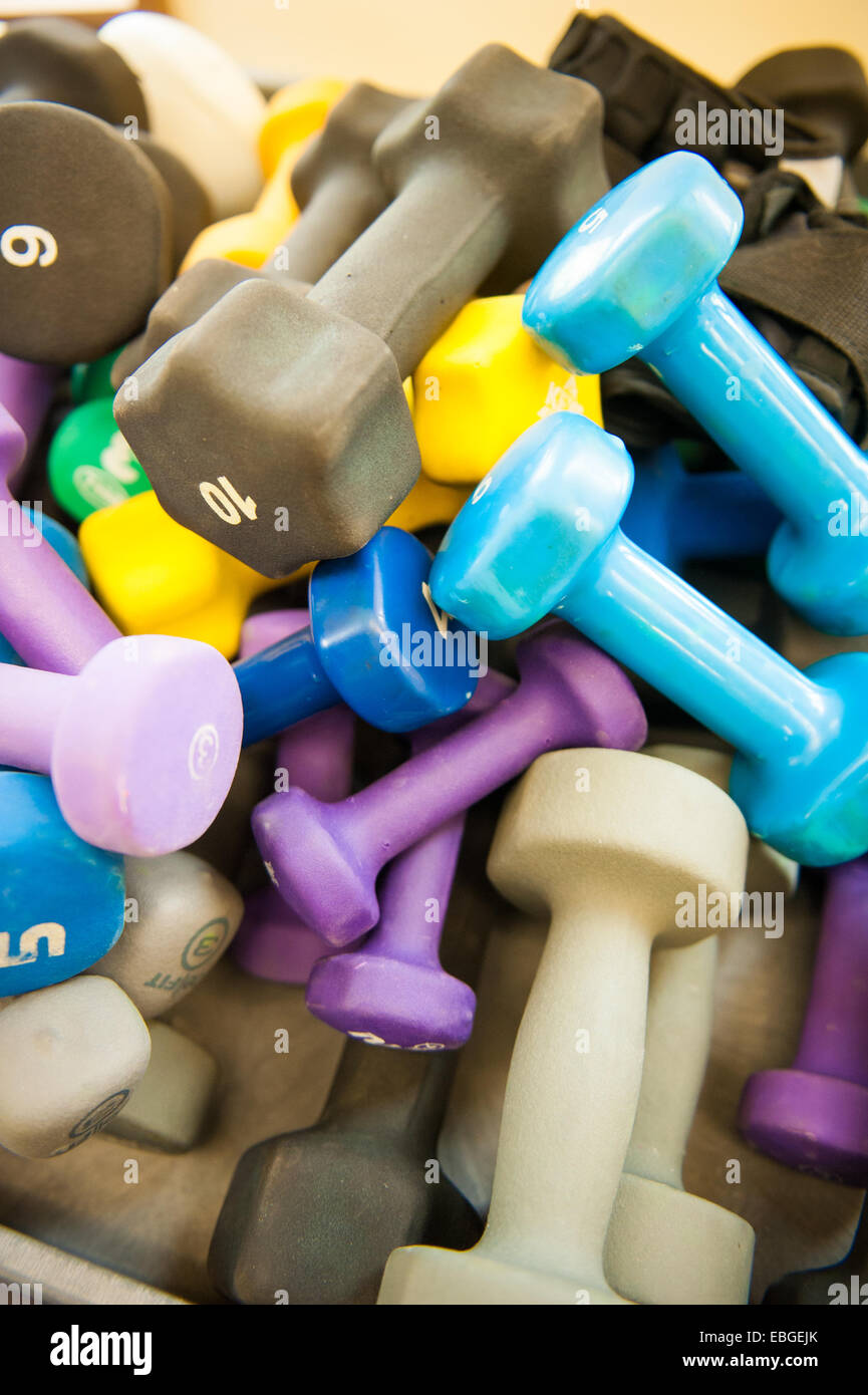Stack of small gym weights Stock Photo - Alamy