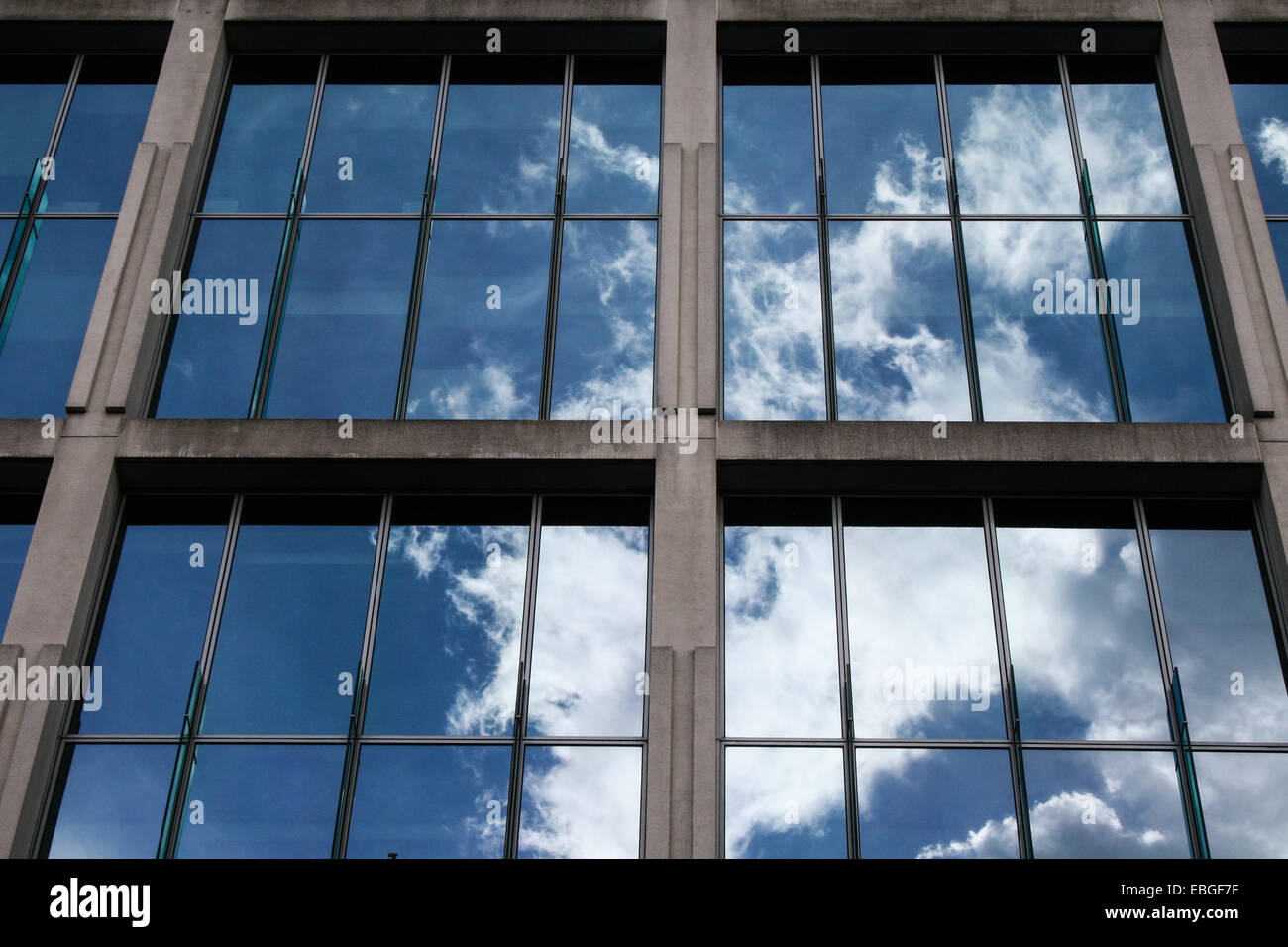 Reflecting skies in office windows Stock Photo - Alamy