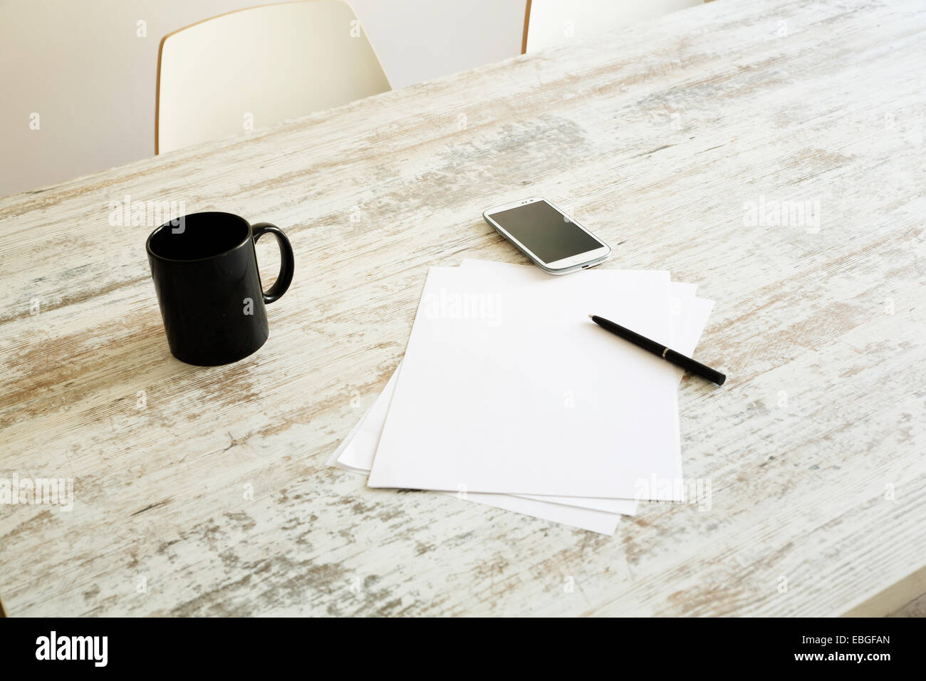 Brainstorming and taking notes at the table Stock Photo - Alamy