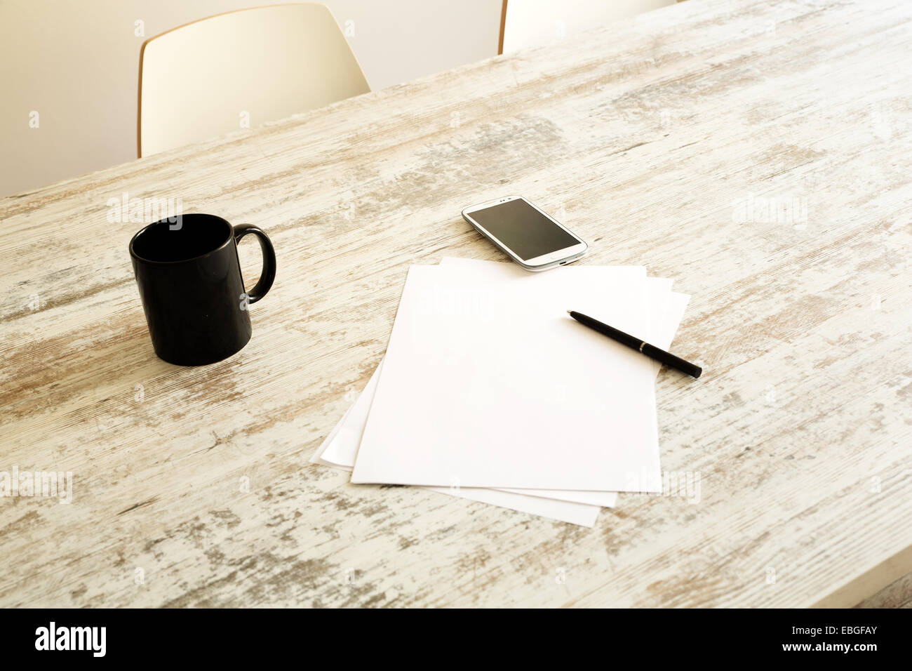 Brainstorming and taking notes at the table Stock Photo - Alamy