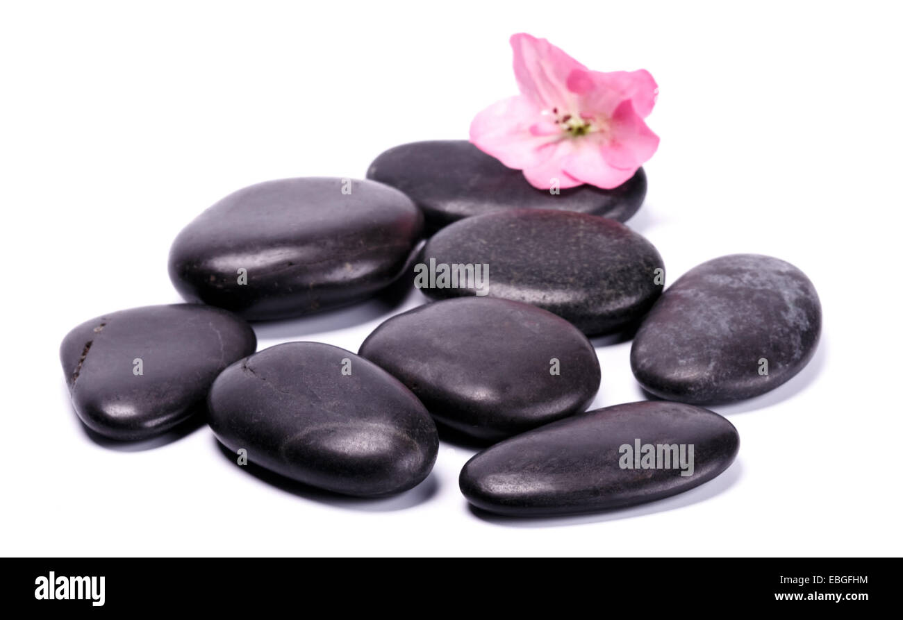 Spa stones on white background Stock Photo - Alamy