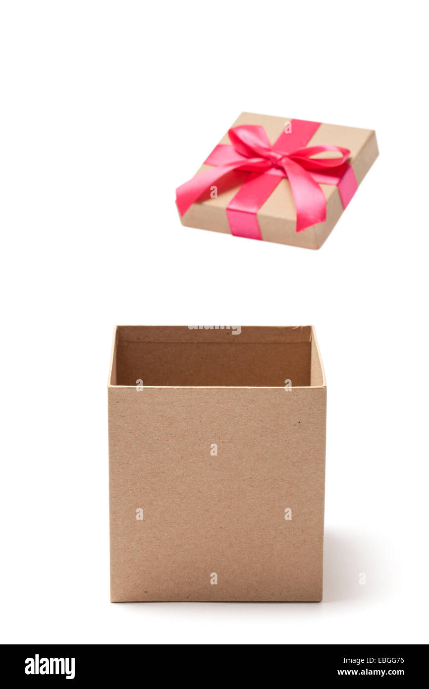 Open empty gift box with red ribbons isolated on white Stock Photo - Alamy