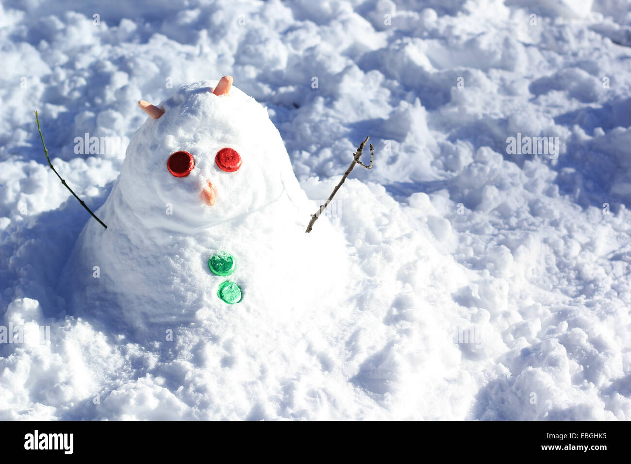Cute little snowman built after a storm Stock Photo - Alamy