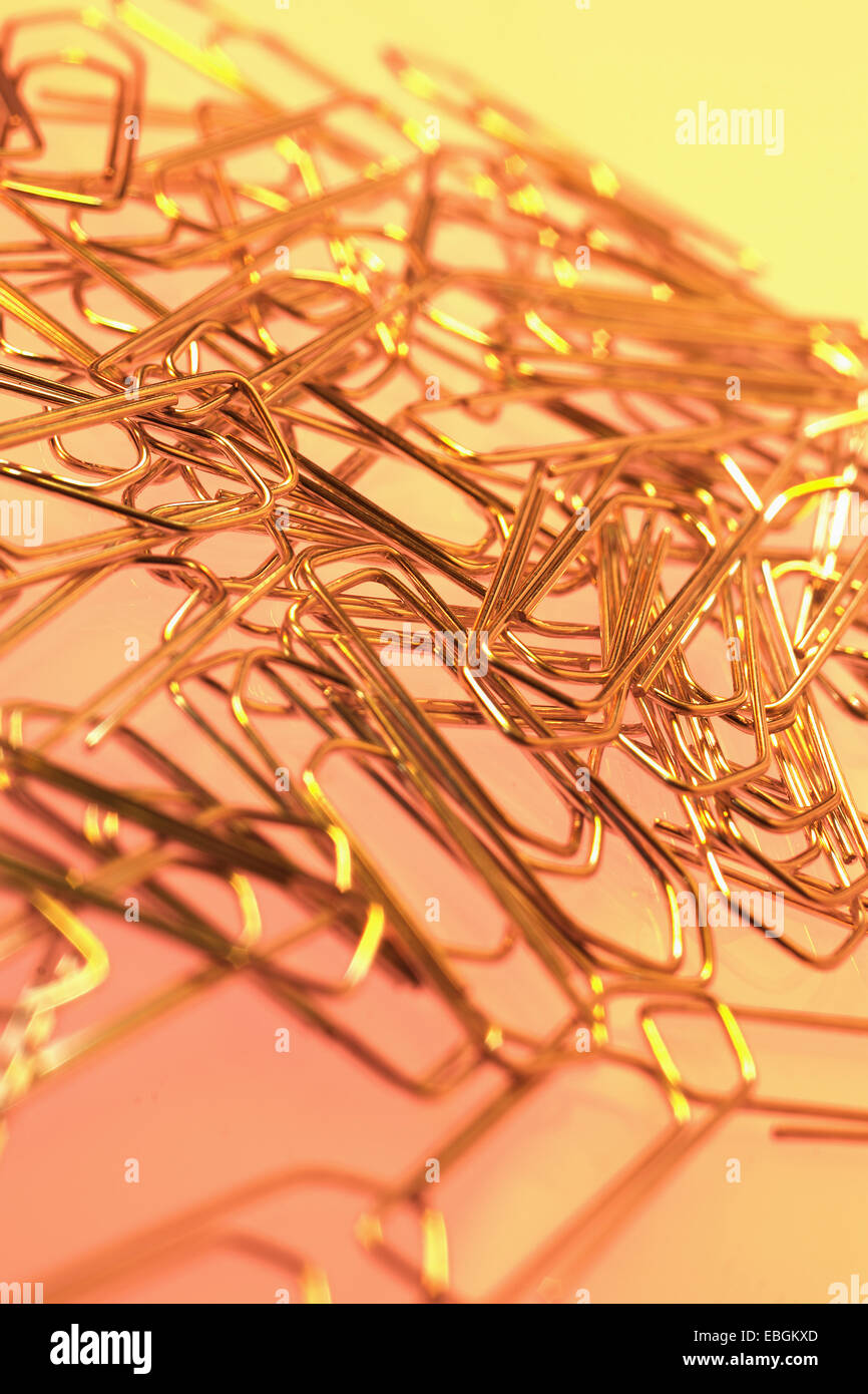 paper clips, detail, coloured light Stock Photo - Alamy