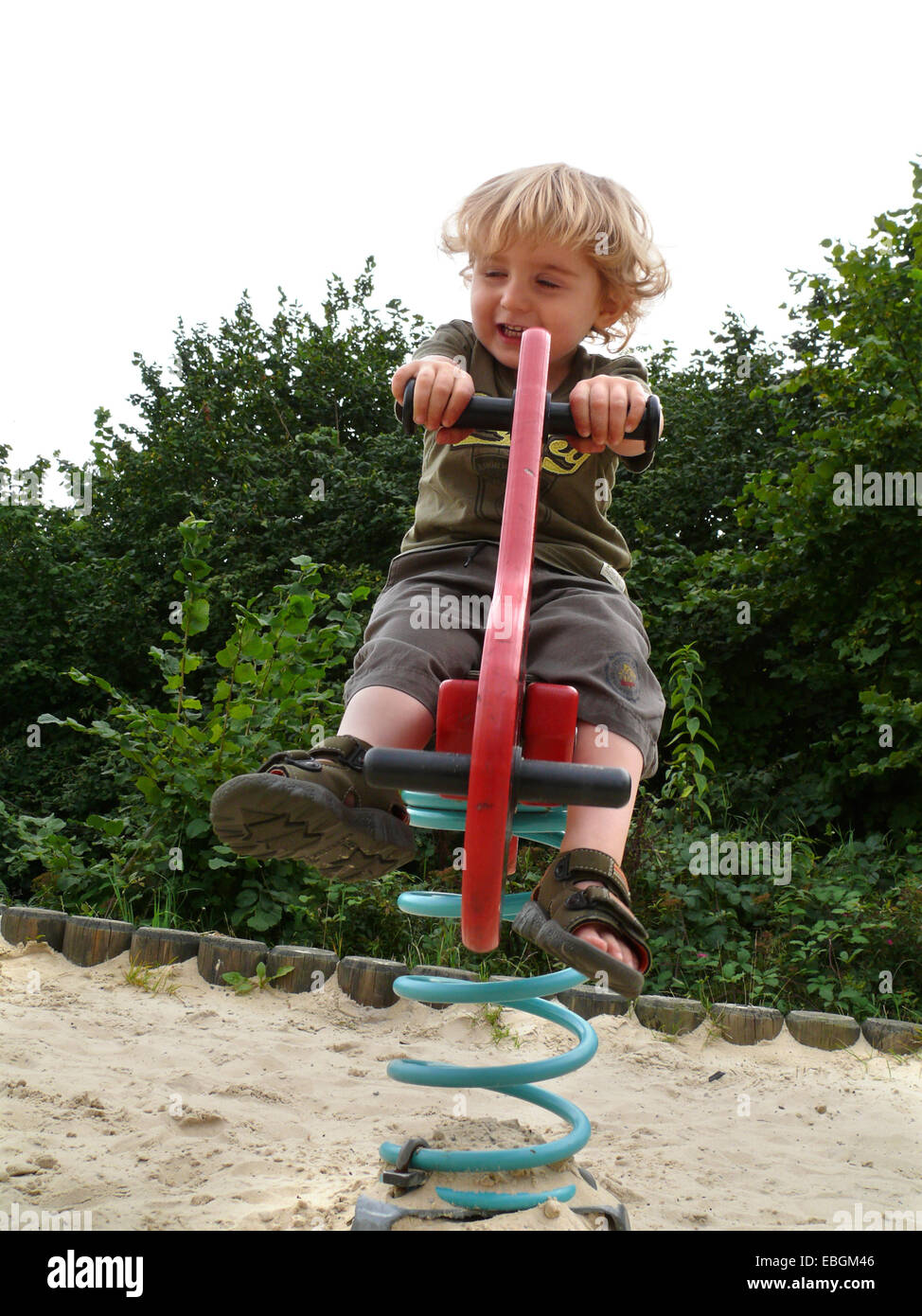 Children playing playground faces hi-res stock photography and images ...