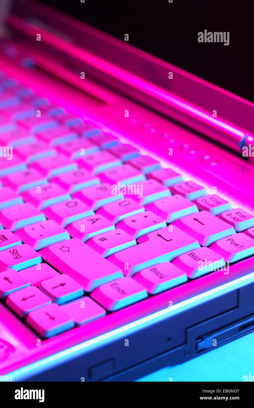 keyboard, detail of computer, laptop, coloured light Stock Photo - Alamy