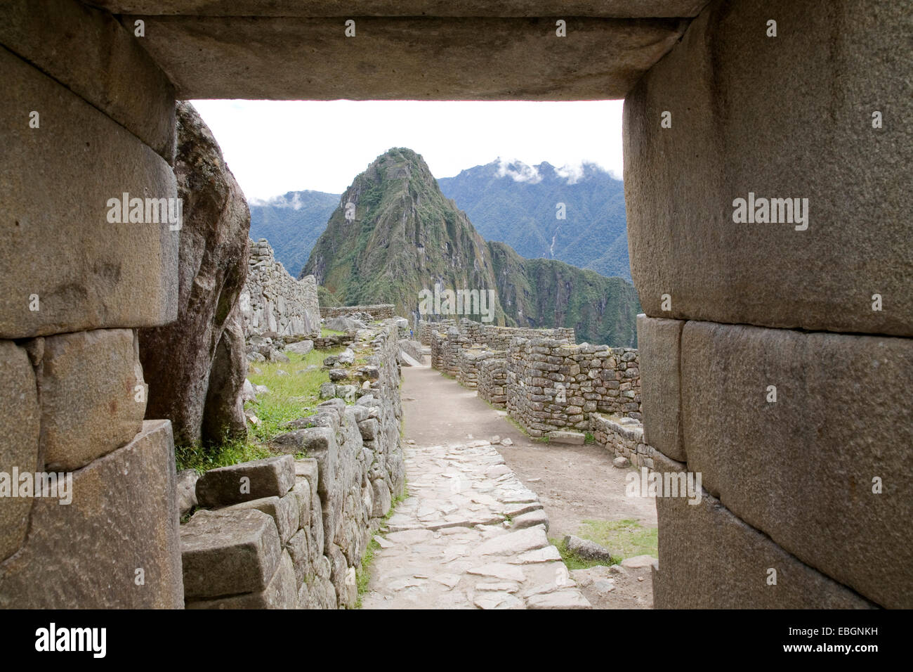 view through a gate of Machu Picchu to Waynapicchu, Peru, Aguas ...