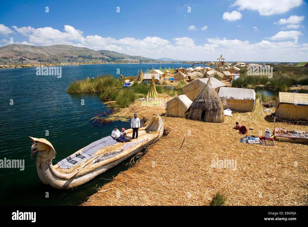 view over self-fashioned floating man-made islets and reed boat, Peru ...