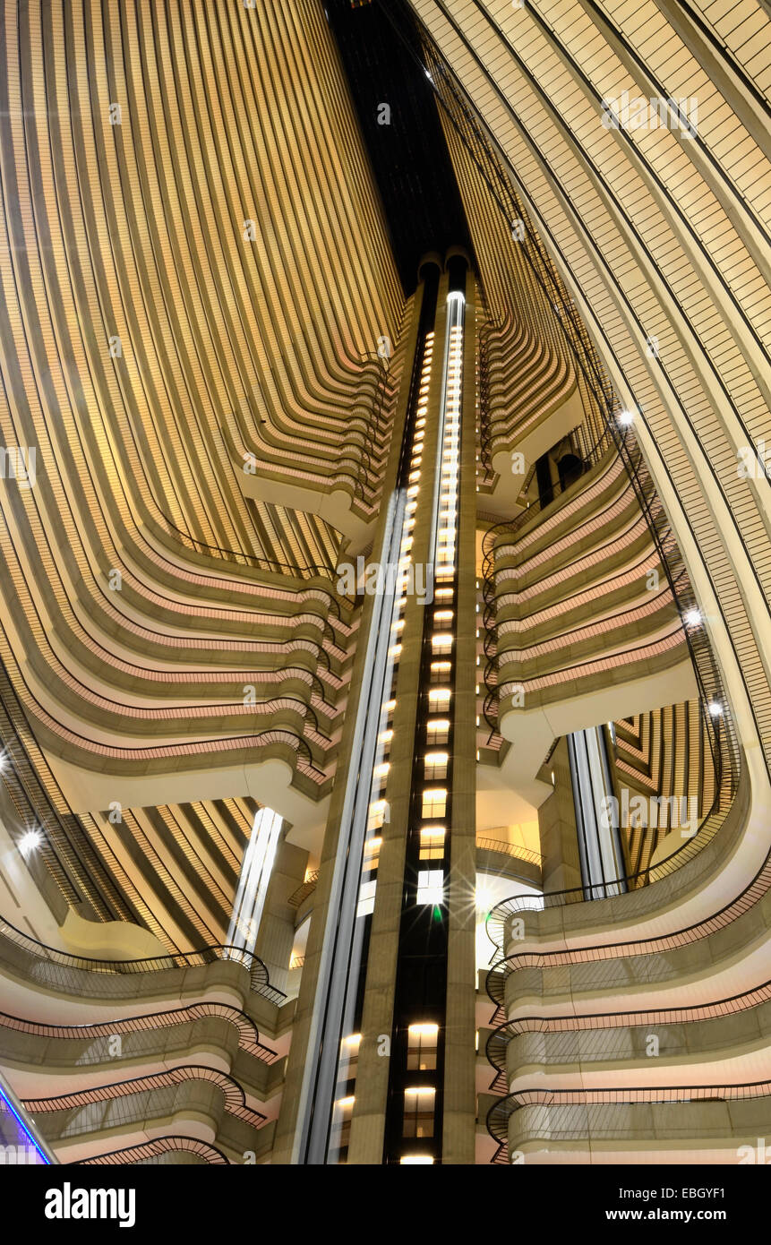 The interior 50 story open atrium of this building creates an ...