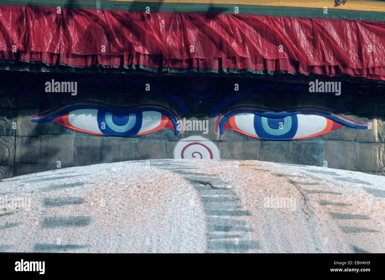 the eyes of Buddha at the Boudhanath stupa, the eyes looking to all ...