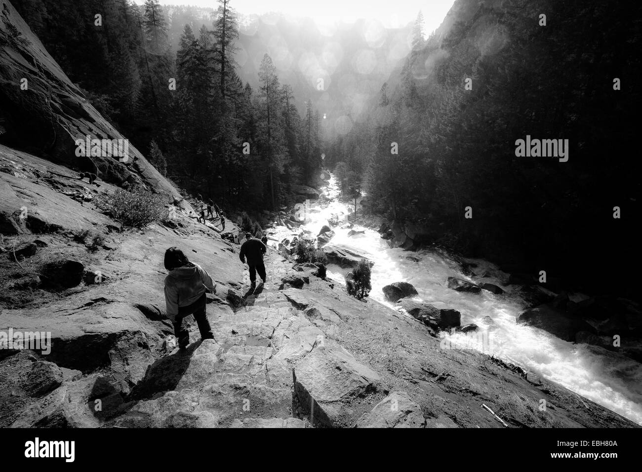 Hikers moving down rock, Yosemite Mist Trail, Vernal Falls, Yosemite ...