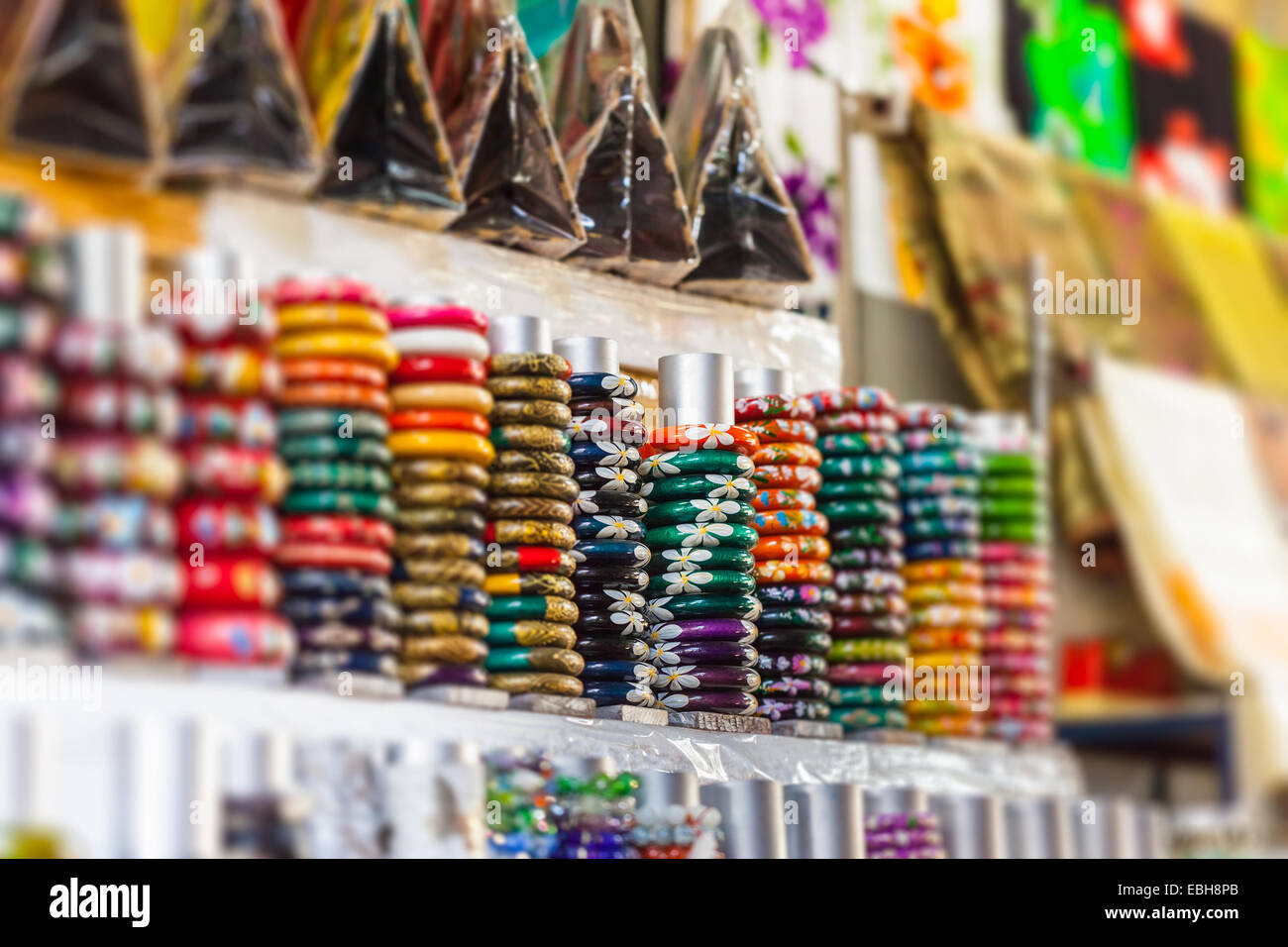 a lot of colorful bracelets on sale in a thai souvenir shop Stock Photo ...