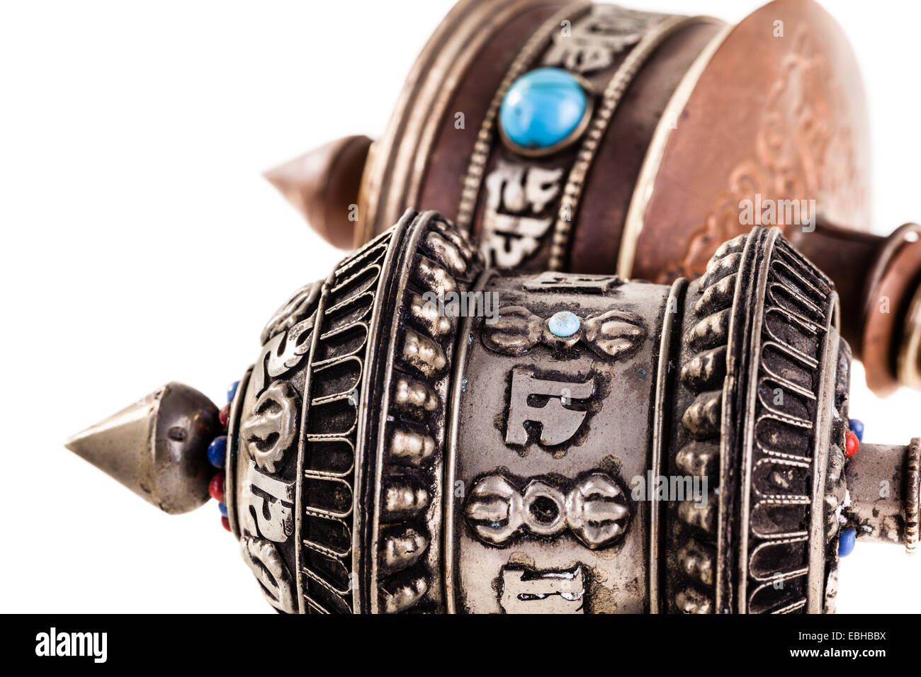 Tibetan Prayer wheel or Mani wheel isolated over a white background ...