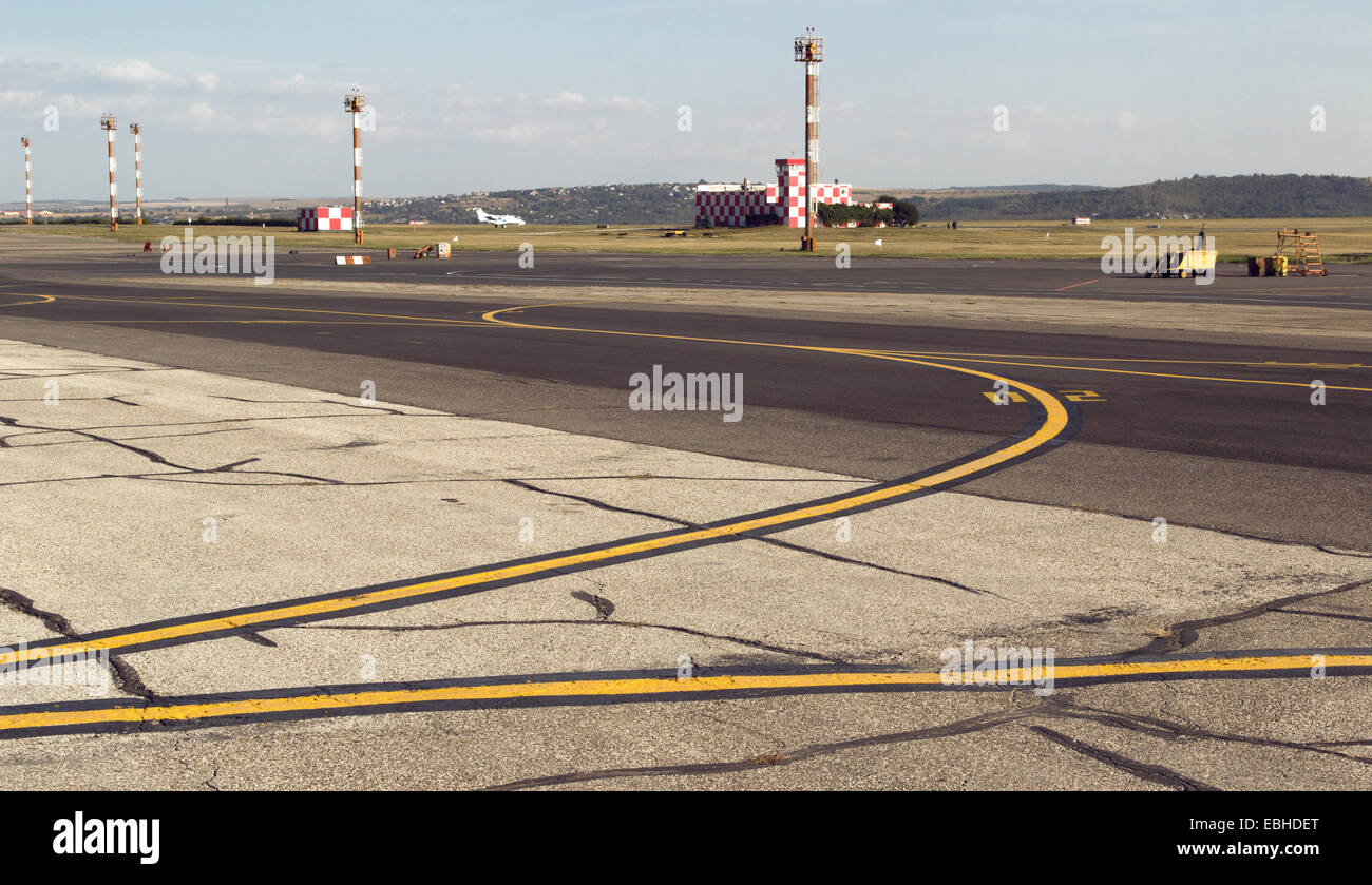 runway of the Chisinau international airport. old, yellow way strip ...