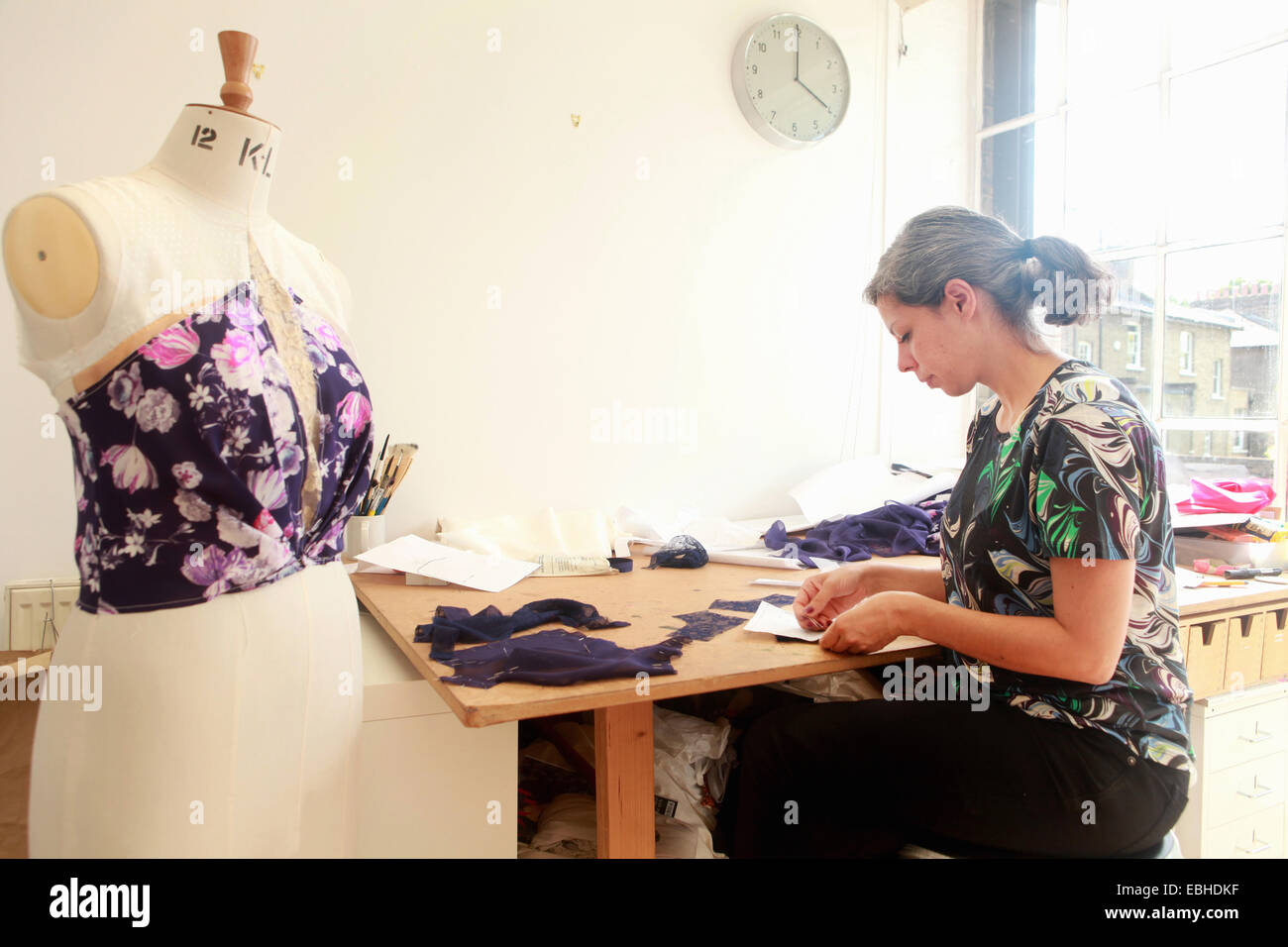 Designer at work in studio Stock Photo - Alamy