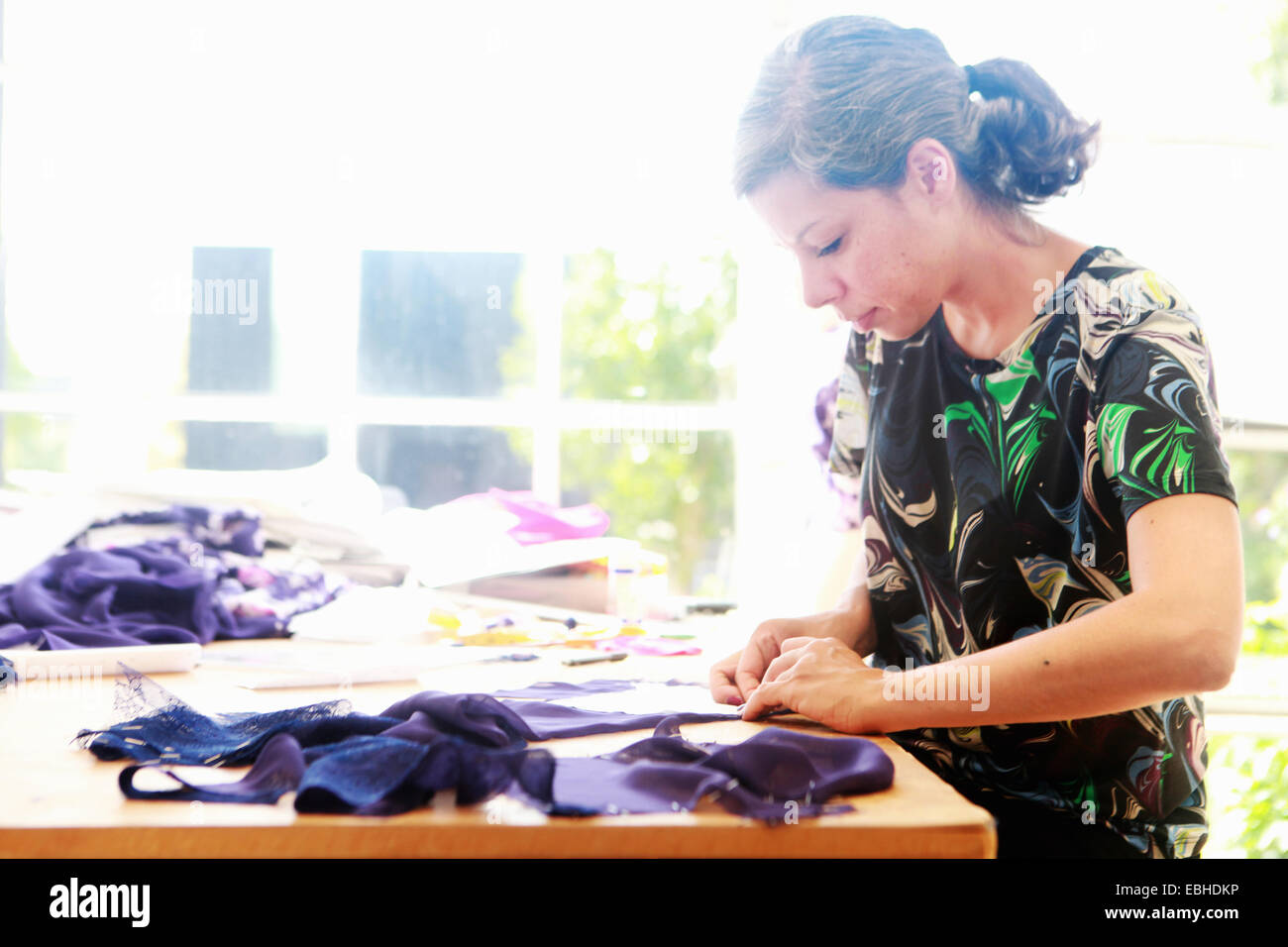 Designer at work in studio Stock Photo - Alamy