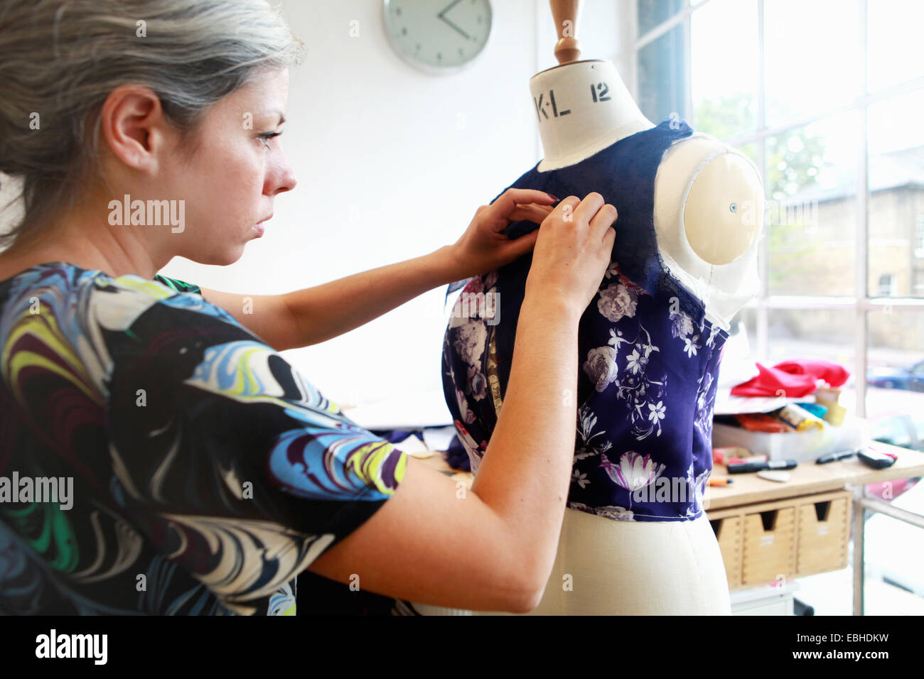 Designer at work in studio Stock Photo - Alamy