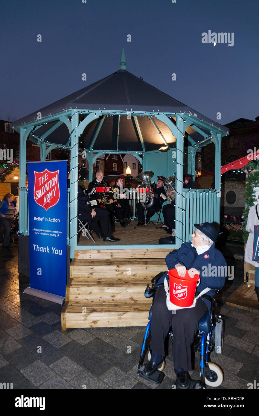 Salvation Army brass band with disabled lady collector collecting cash ...