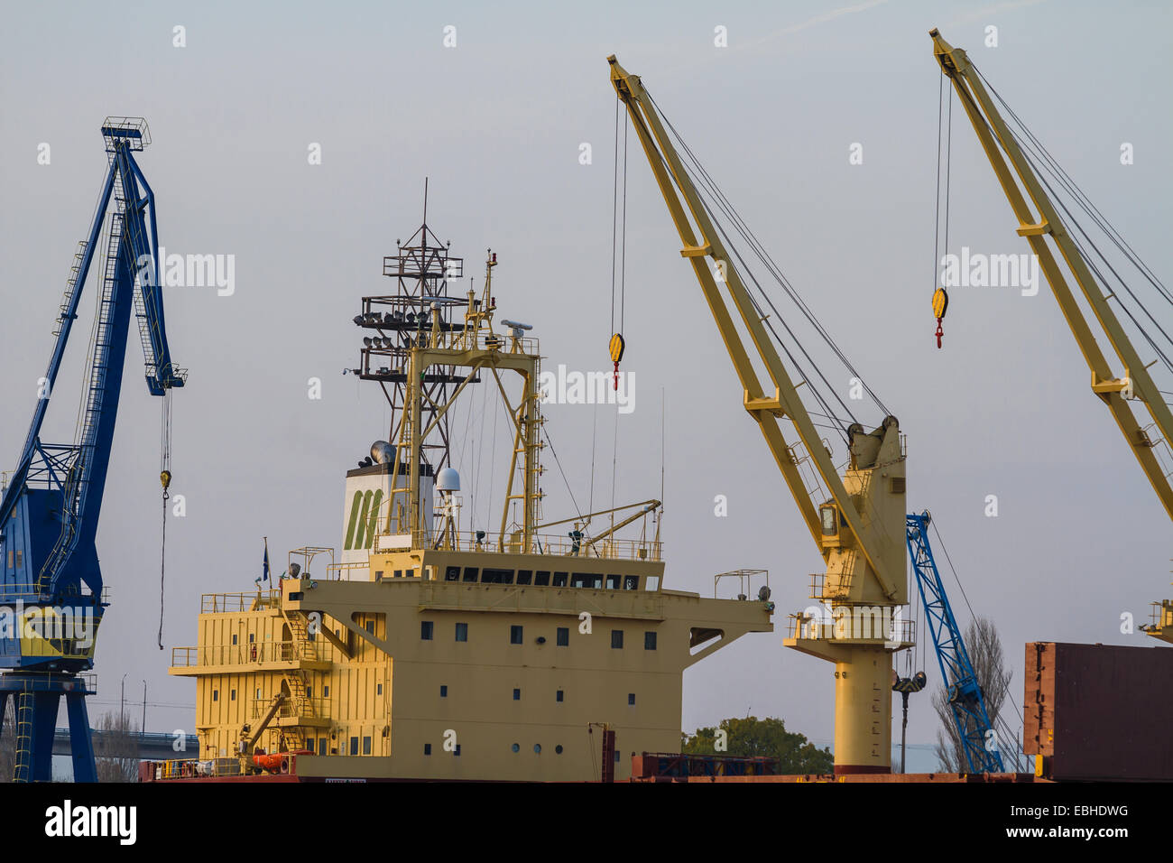 Industrial Container Cargo freight ship with working crane bridge in ...