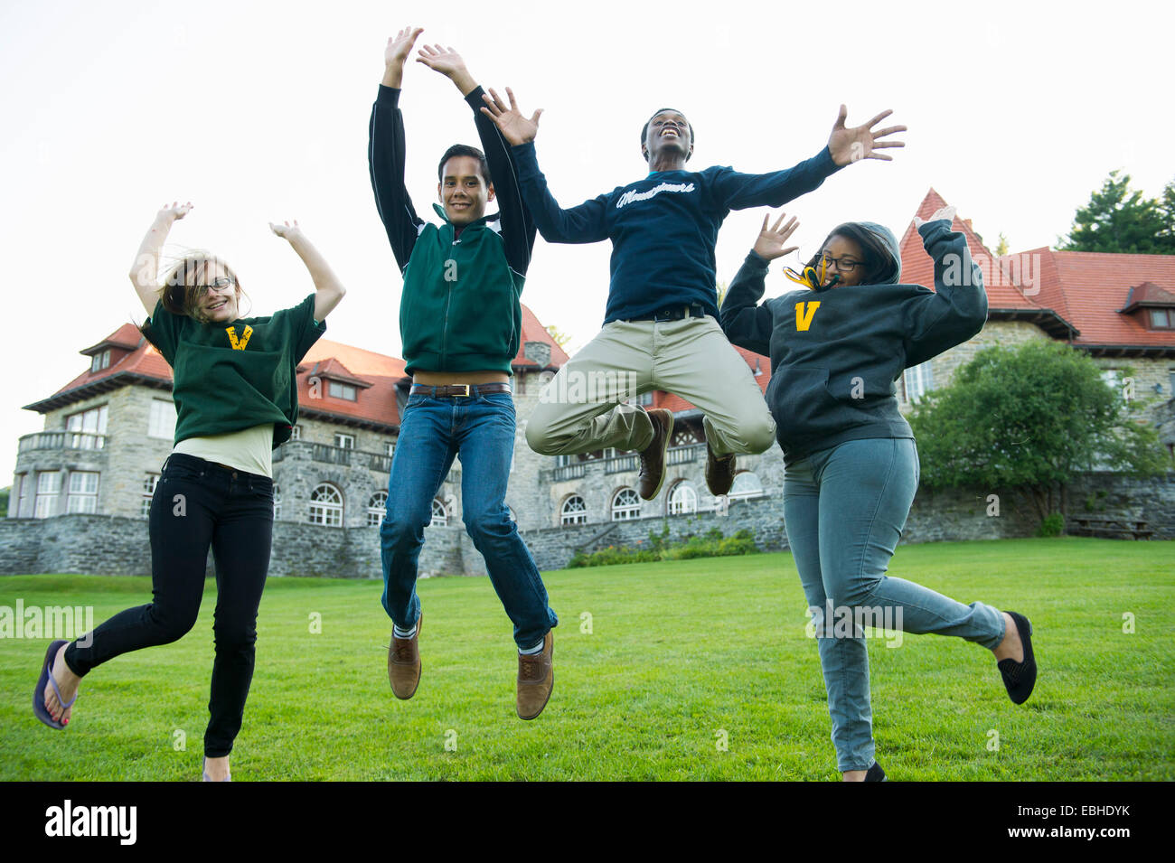 Friends Jumping In Air