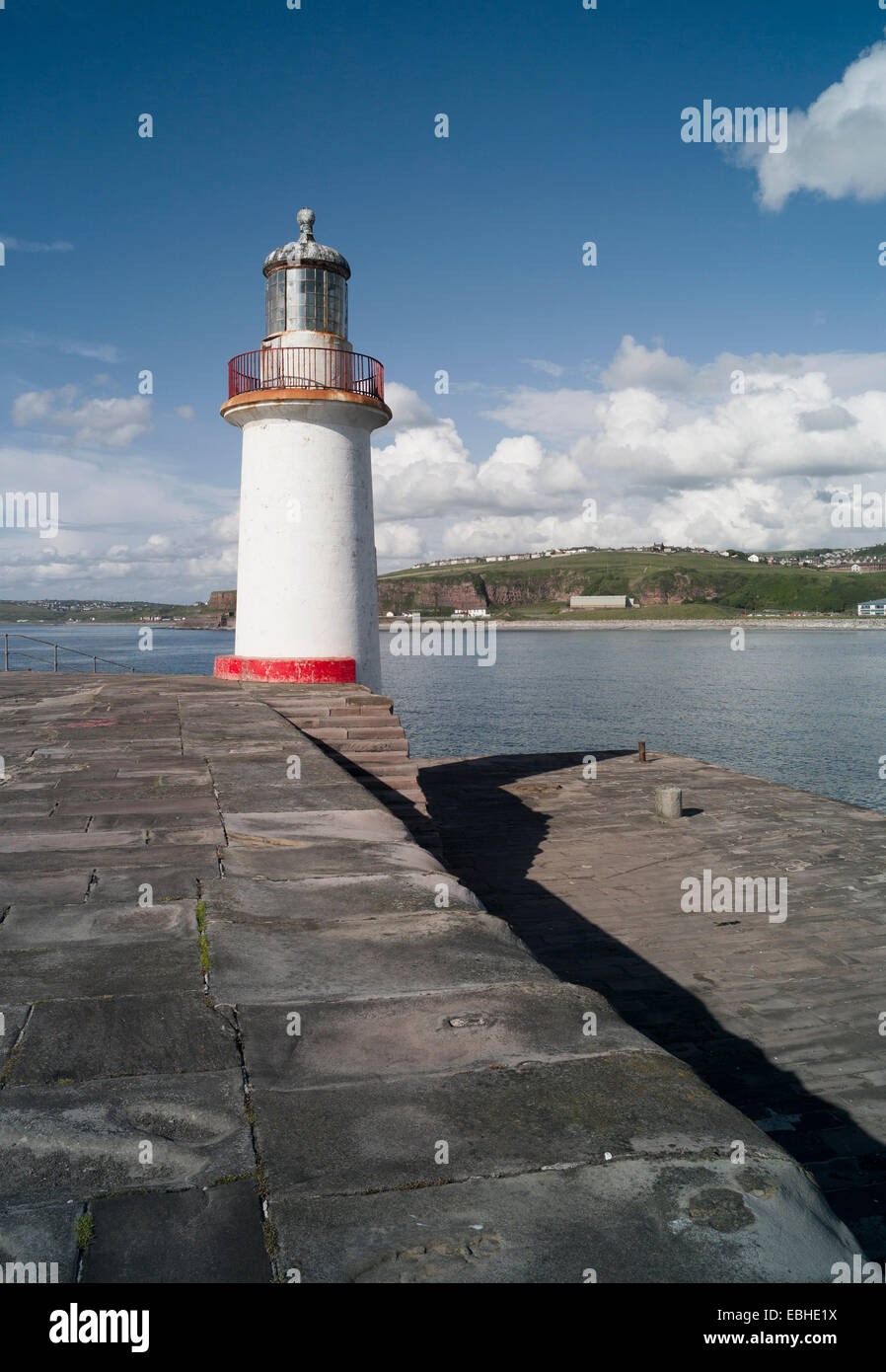 Lighthouse and sea defense, Whitehaven, Cumbria, England Stock Photo ...