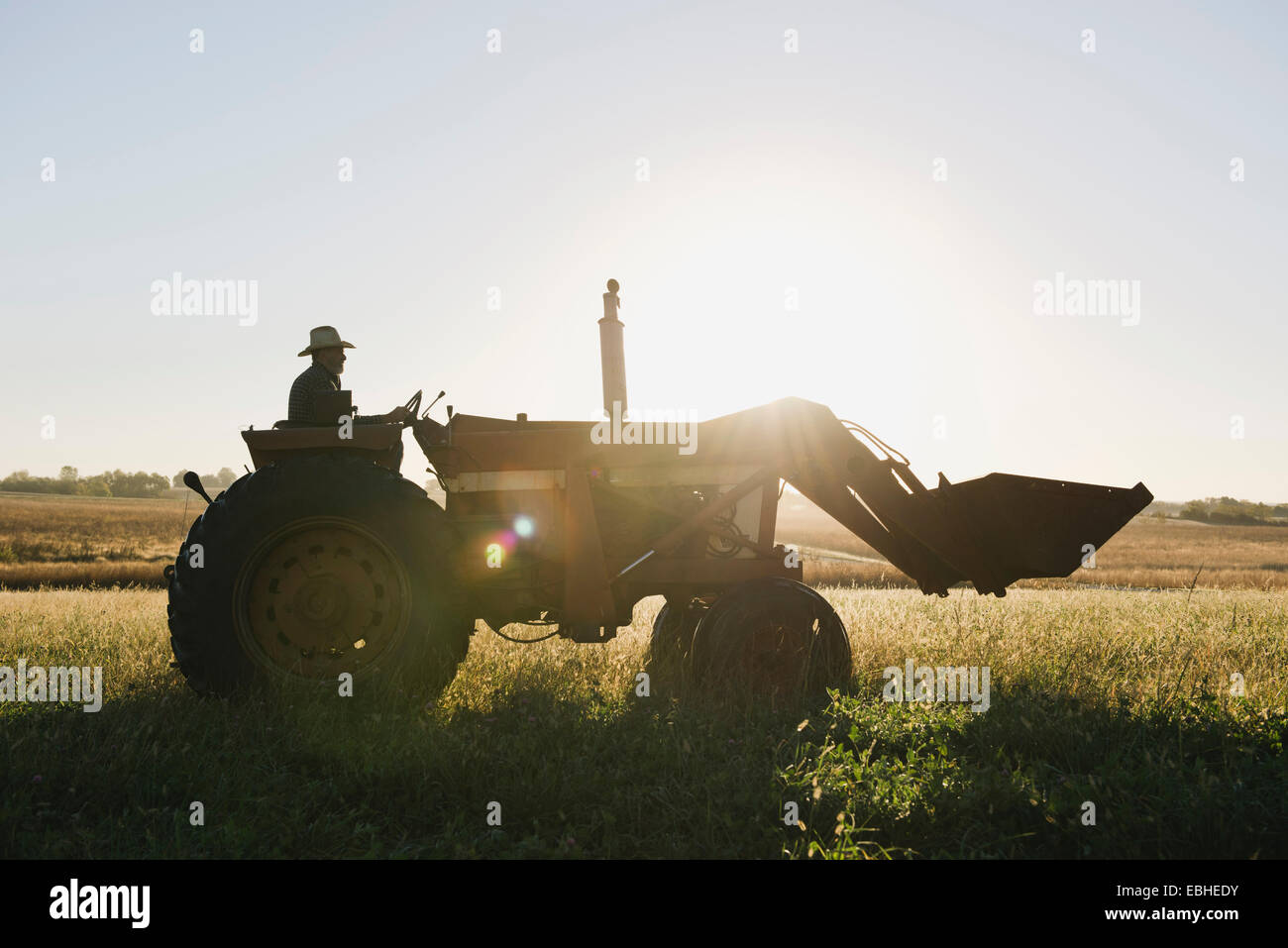 Person Driving Tractor High Resolution Stock Photography and Images - Alamy