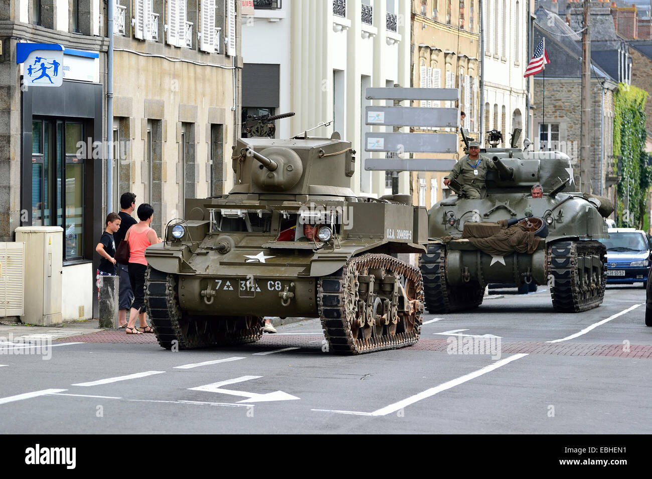 American war vehicles of the 2nd World War, tanks drive on the street ...