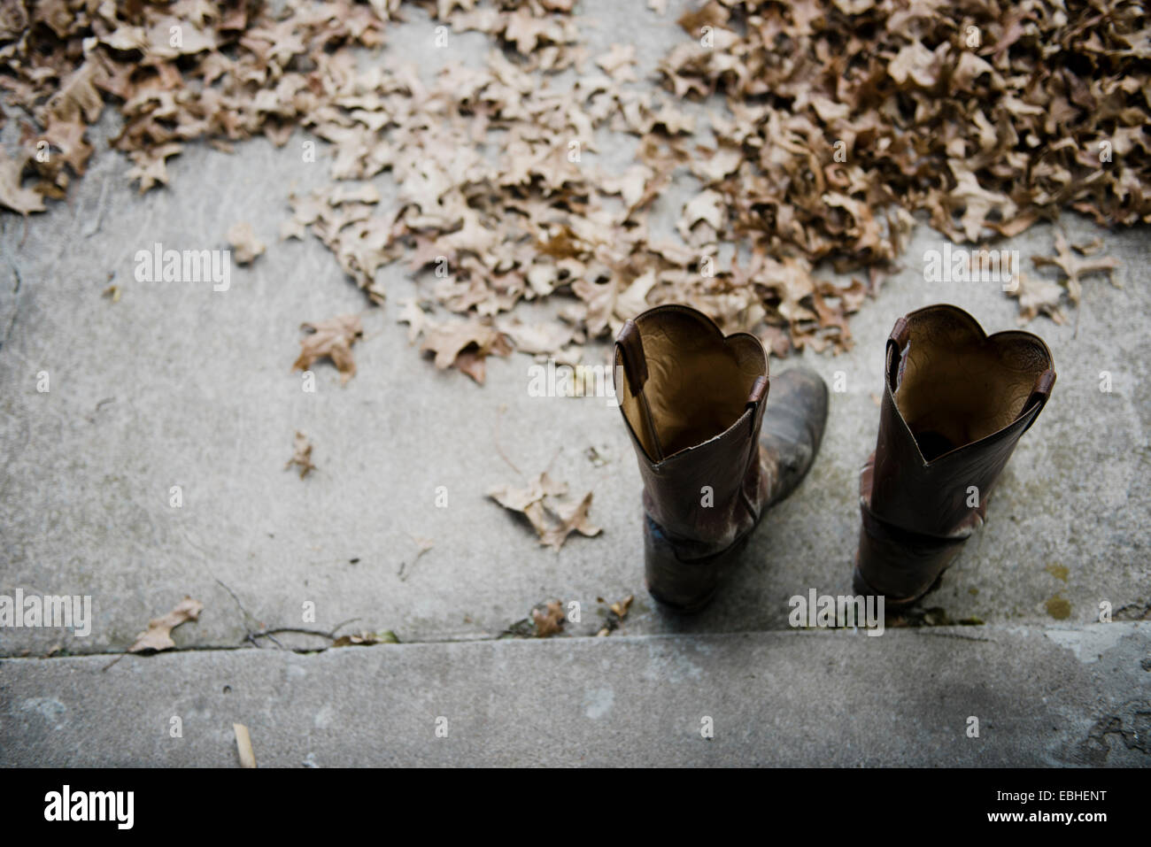 High angle view of a pair of cowboy boots on step Stock Photo - Alamy