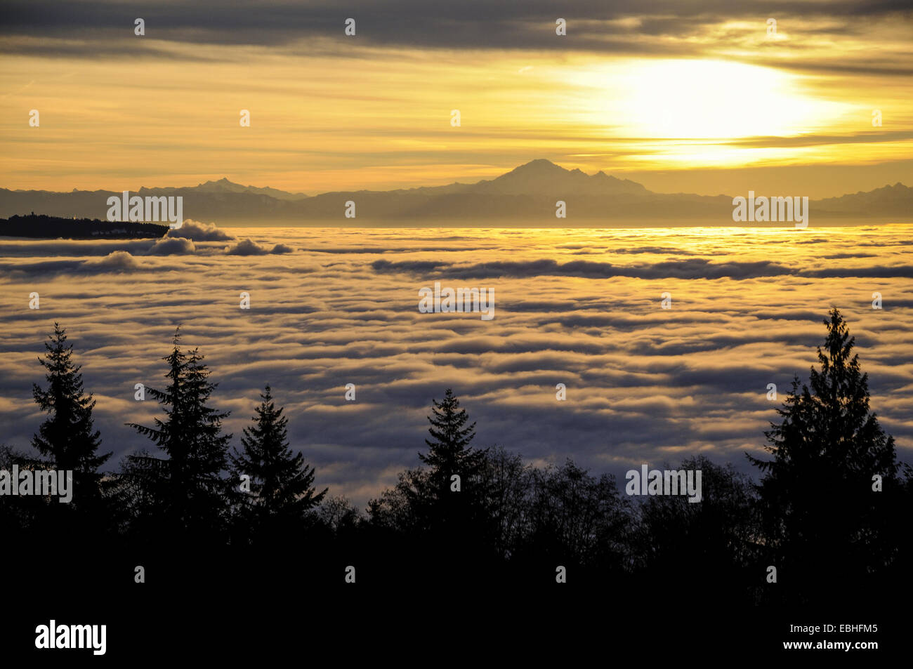 Only the mountains rise above the clouds during a temperature inversion ...
