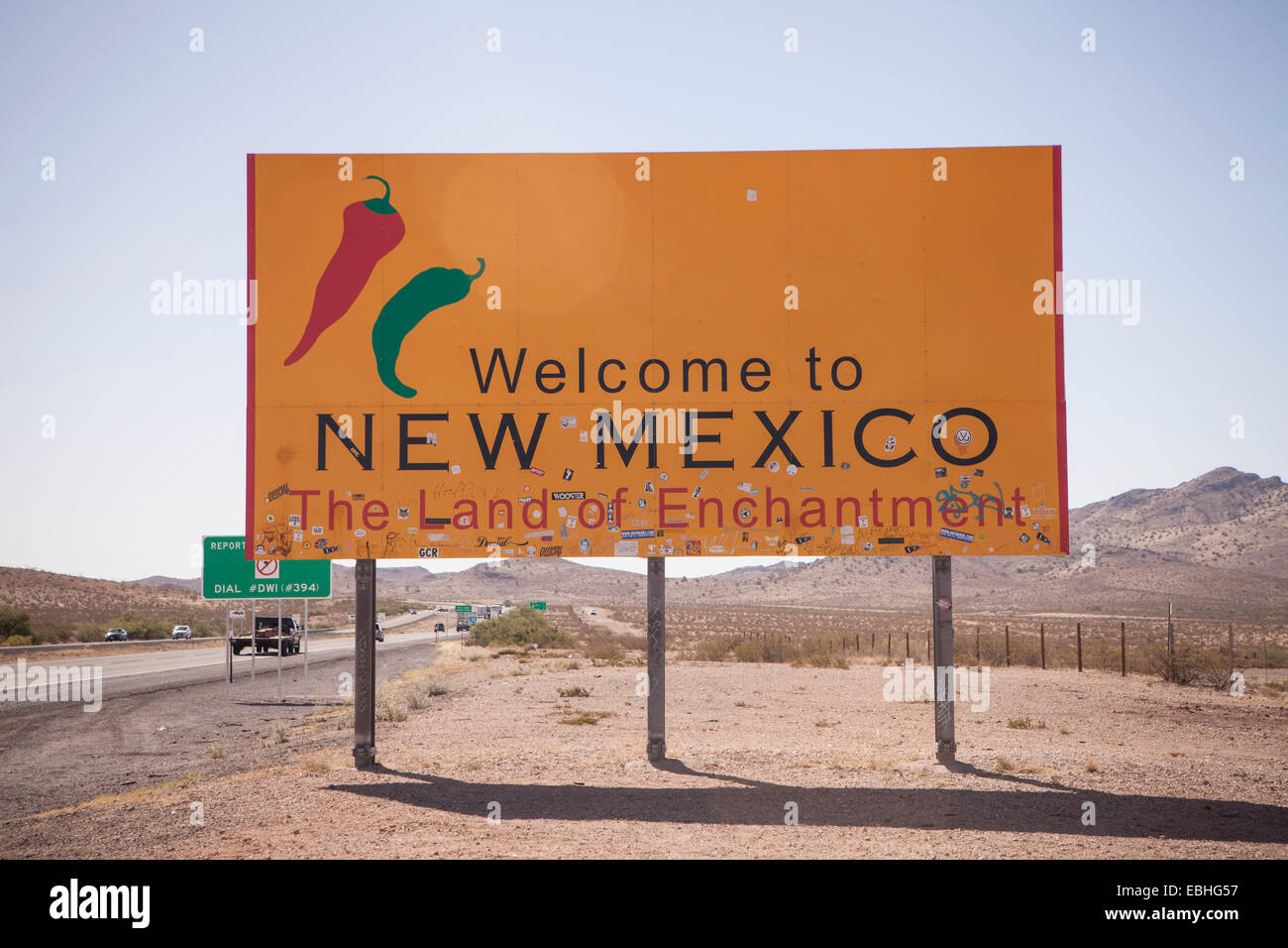 Road sign and highway, New Mexico State Line, USA Stock Photo - Alamy
