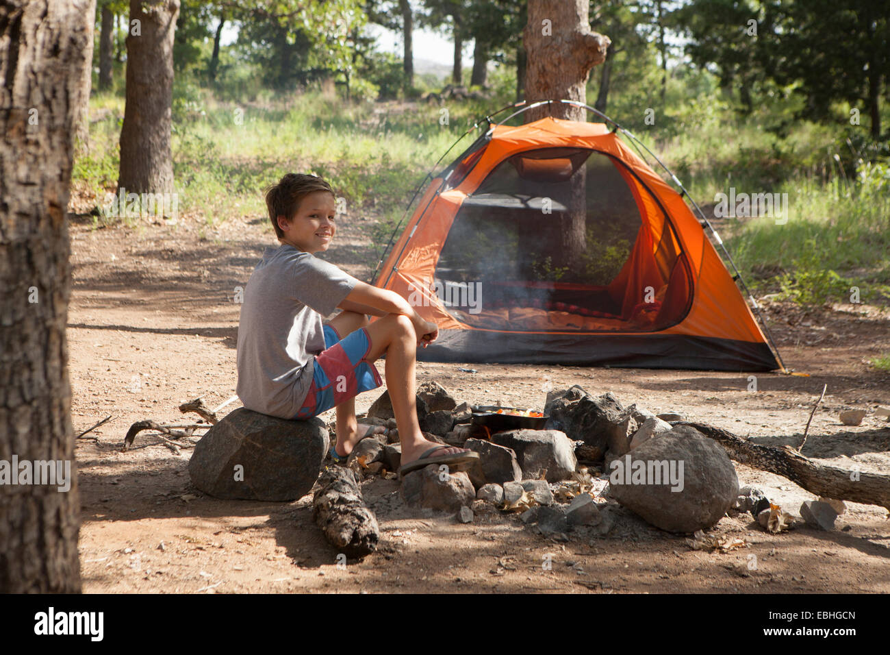 Teenage boy preparing campfire, Indiahoma, Oklahoma, USA Stock Photo ...