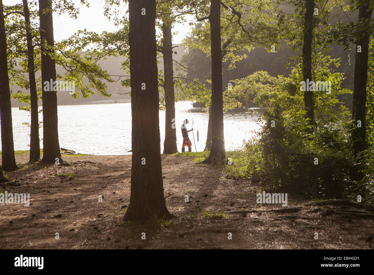 Teenage boy fishing forest lake hi-res stock photography and images - Alamy