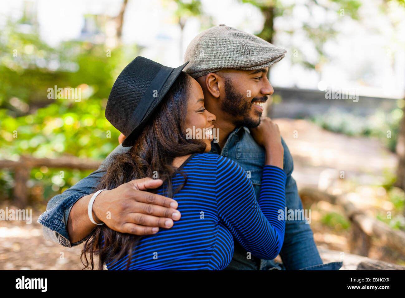 Happy couple hugging Stock Photo - Alamy