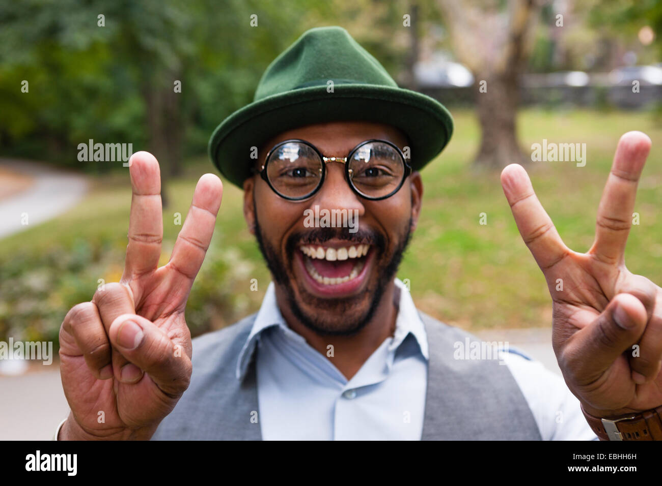 Man making peace sign hi-res stock photography and images - Alamy Man making peace sign hi-res stock photography and images - Alamy
