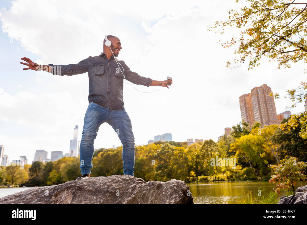 Man wearing earphones dancing, Central Park, New York, USA Stock Photo ...