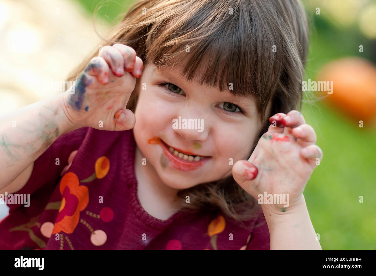 Girl with messy hands Stock Photo - Alamy