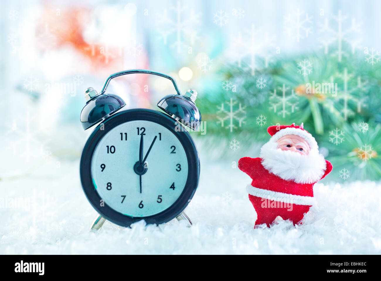 clock and christmas decoration on the snow Stock Photo - Alamy