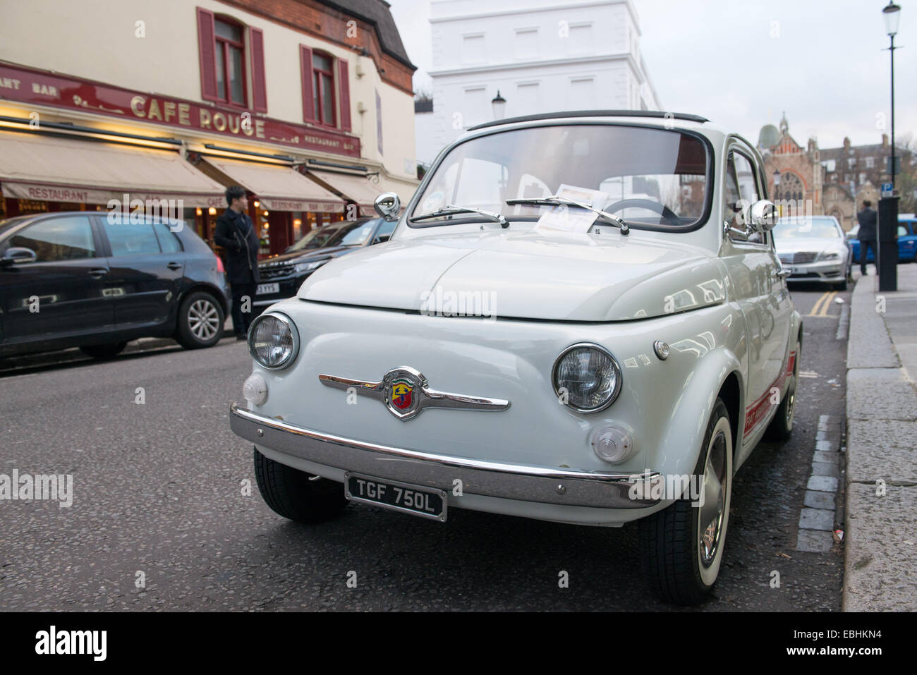 Expensive cars parked by Harrods in West London Stock Photo - Alamy