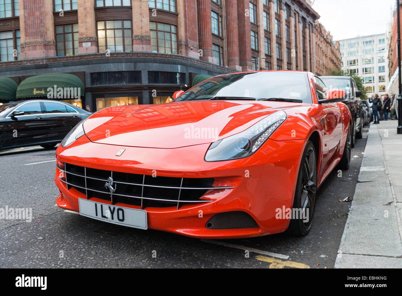 Expensive cars parked by Harrods in West London Stock Photo - Alamy