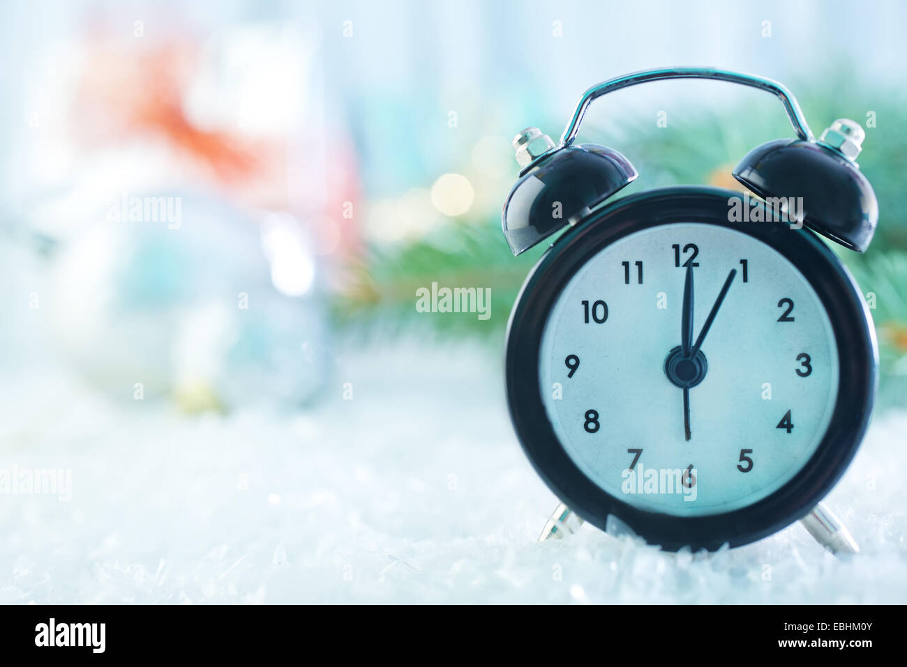 clock and christmas decoration on the snow Stock Photo - Alamy