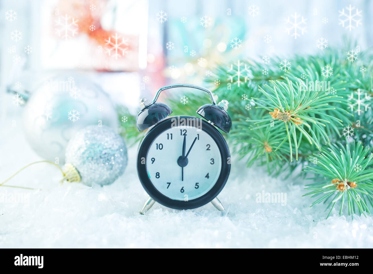 clock and christmas decoration on the snow Stock Photo - Alamy