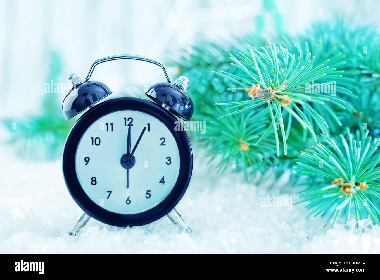 clock and christmas decoration on the snow Stock Photo - Alamy