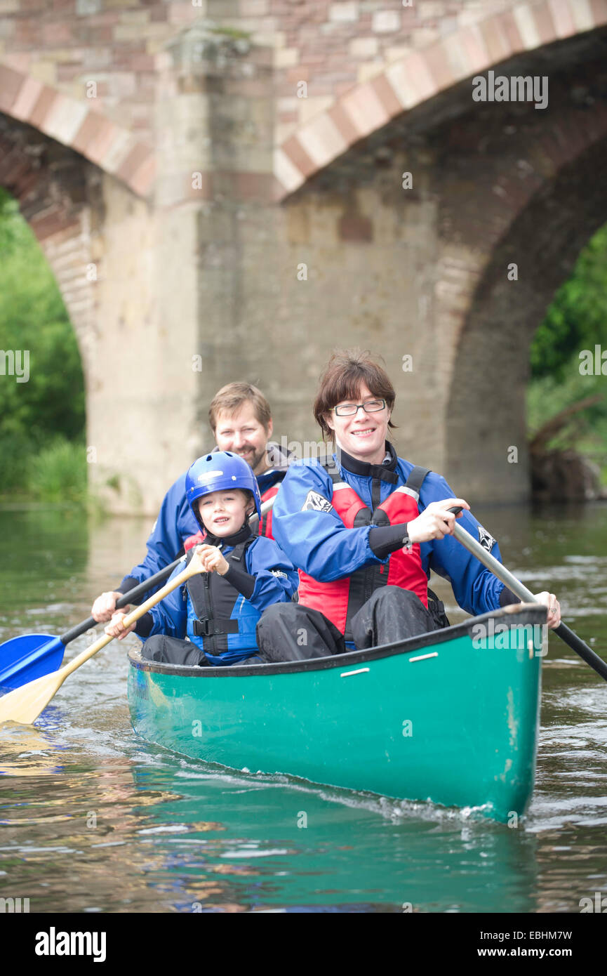 A family canoeing down the river Wye Stock Photo - Alamy
