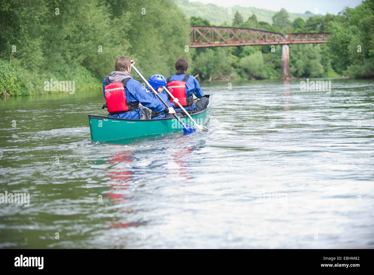 A family canoeing down the river Wye Stock Photo - Alamy