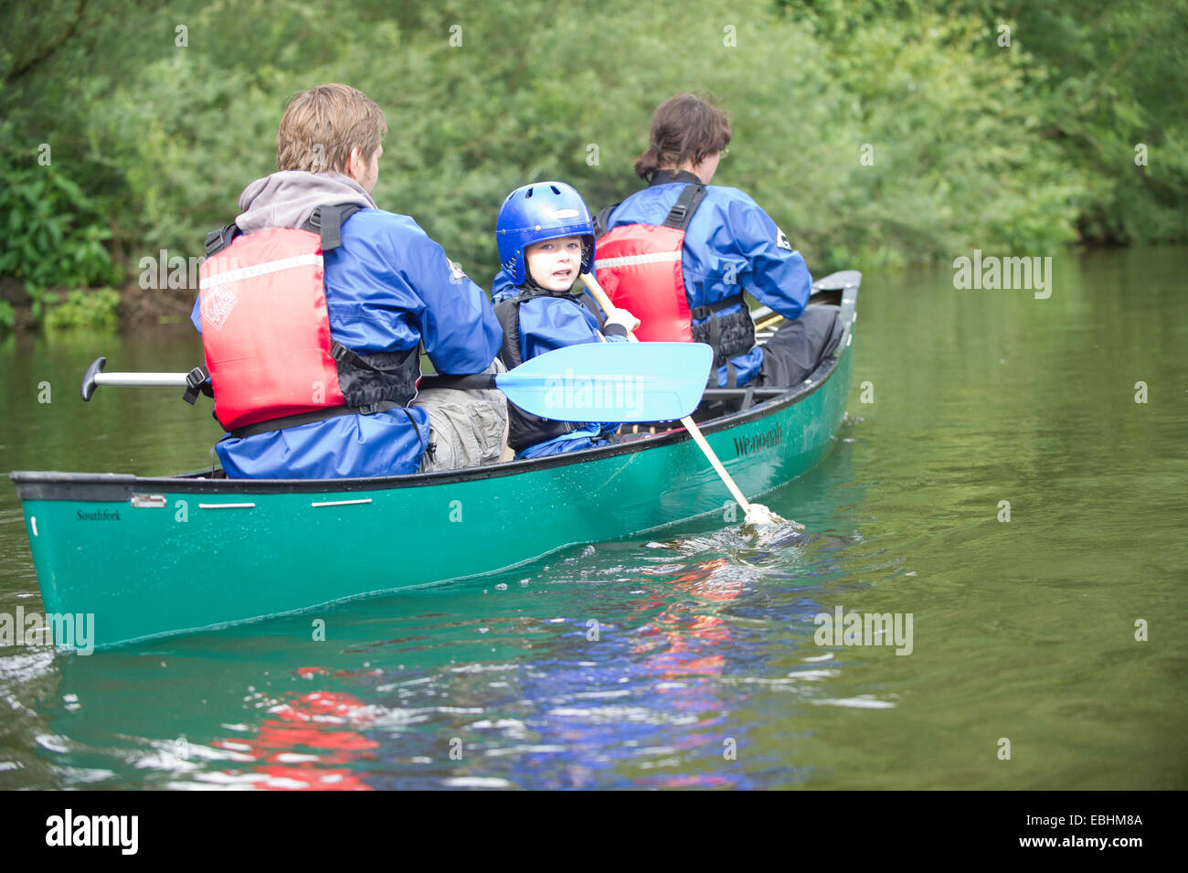 A family canoeing down the river Wye Stock Photo - Alamy