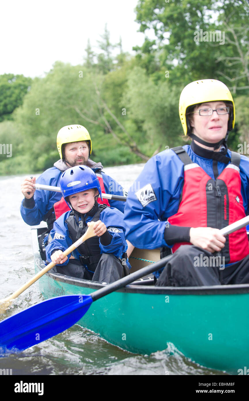 A family canoeing down the river Wye Stock Photo - Alamy